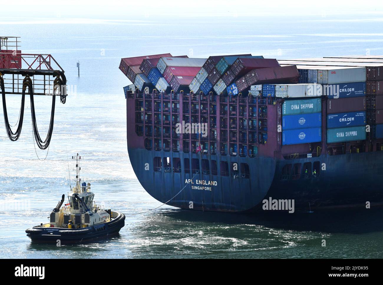 Fallen shipping containers can be seen on the Singapore-flagged ...