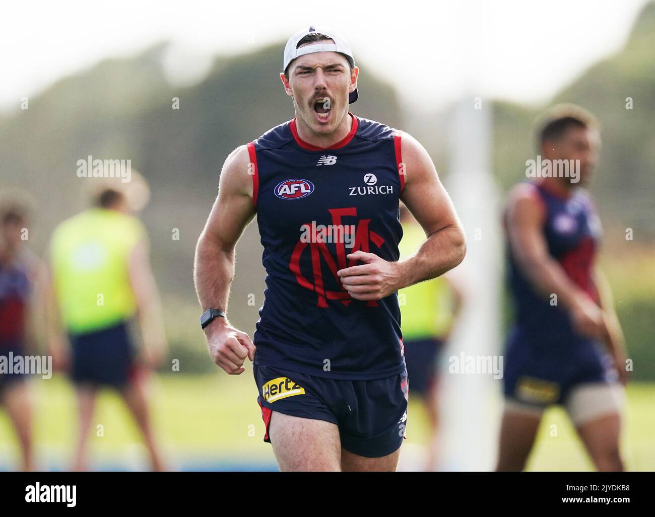 Michael Hibberd of the Demons reacts during an AFL Demons training ...