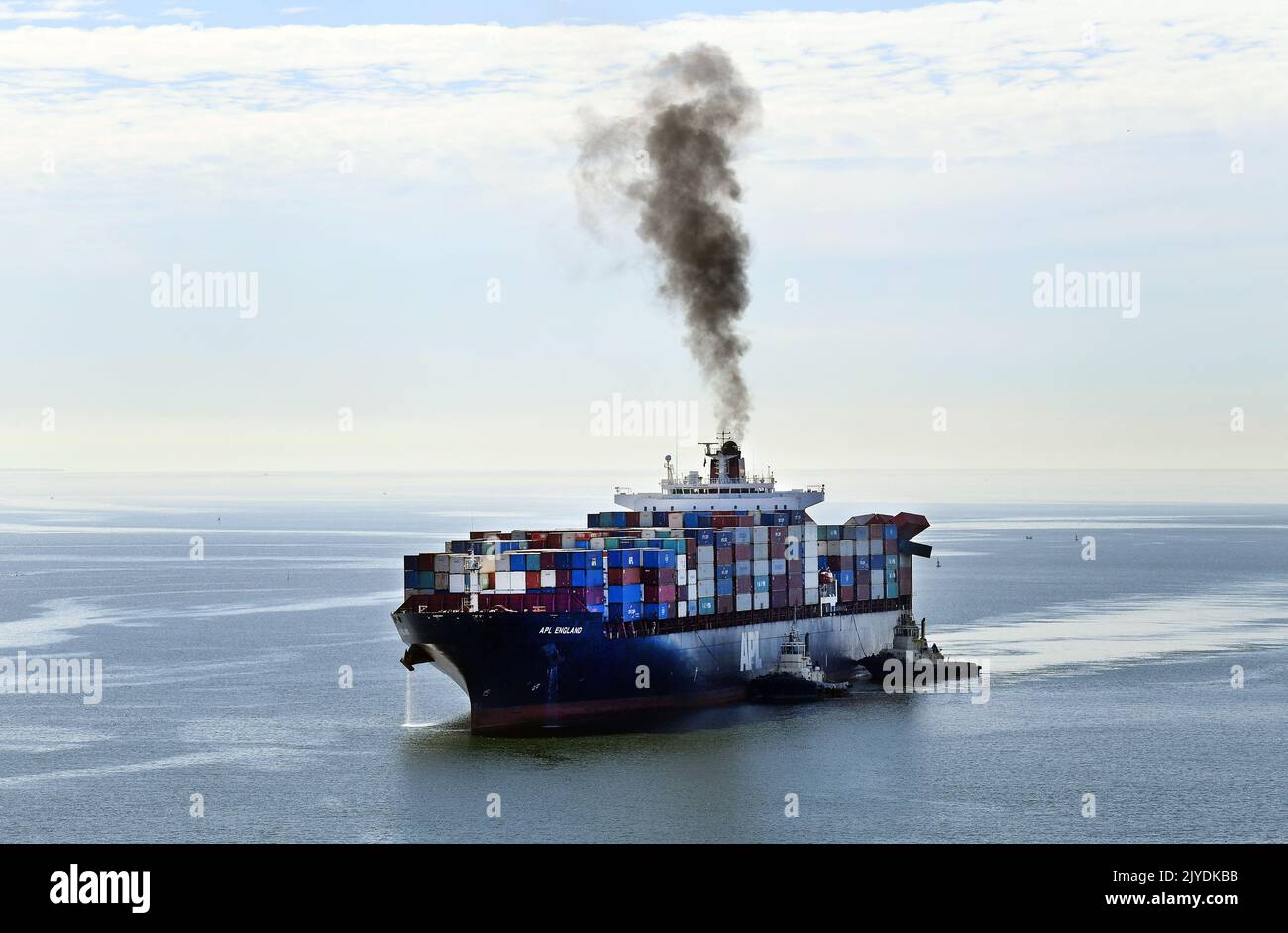 Fallen shipping containers can be seen on the Singapore-flagged ...
