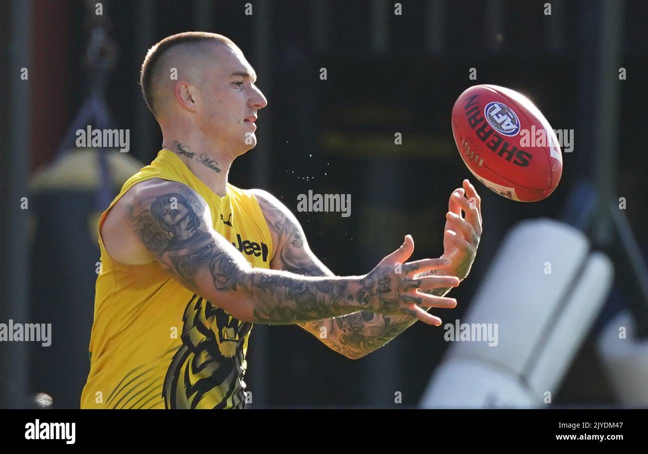 Dustin Martin runs with the ball during an AFL Richmond Tigers training ...