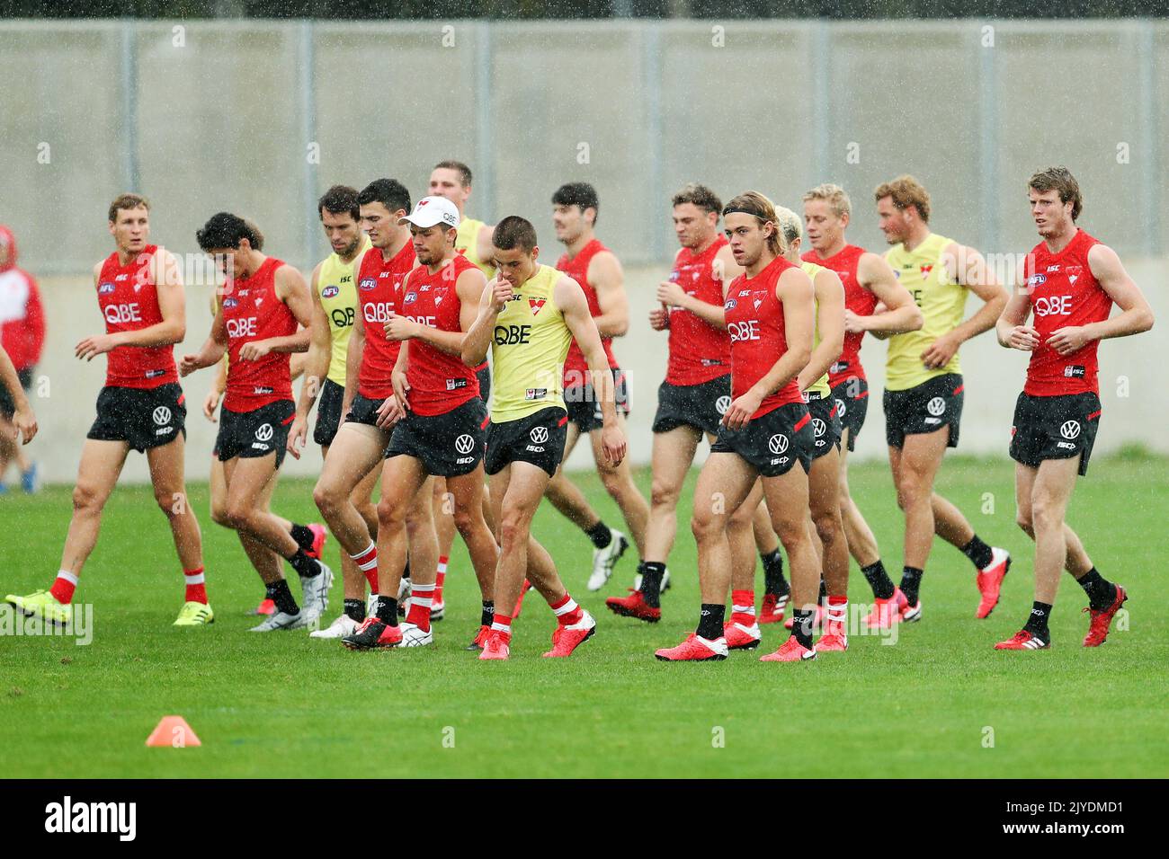 Swans players warm up during a Sydney Swans training session at ...