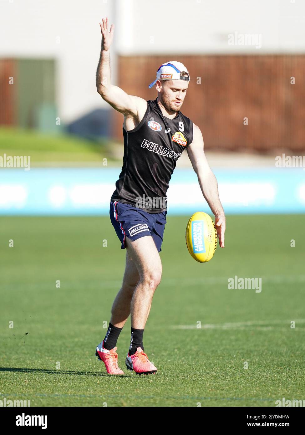 Hayden Crozier kicks the ball during an AFL Bulldogs training session ...