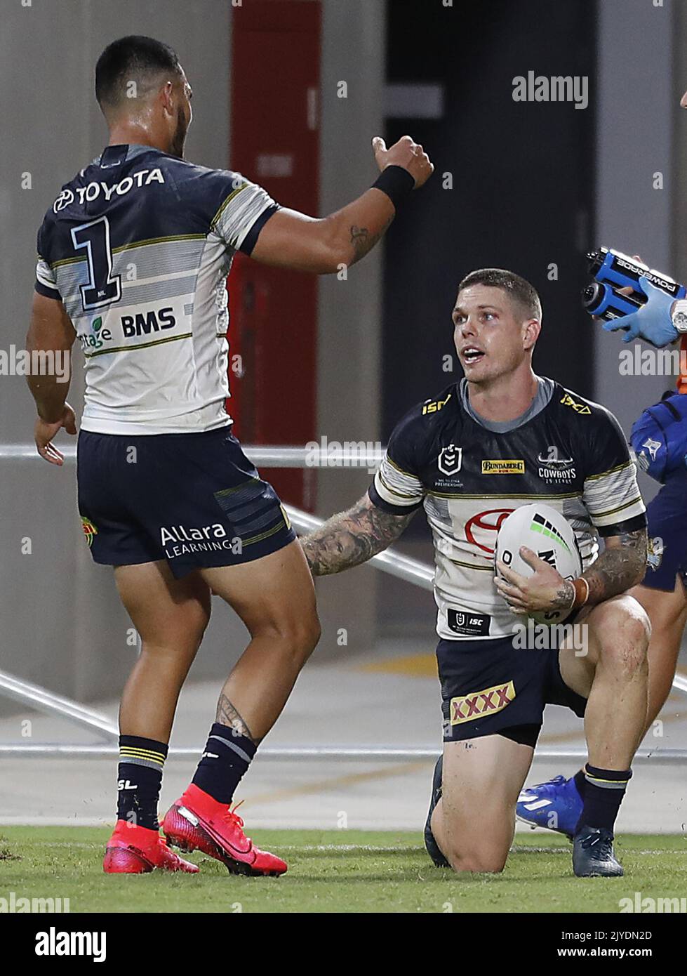 Valentine Holmes (left) celebrates with try-scorer Ben Hampton during ...