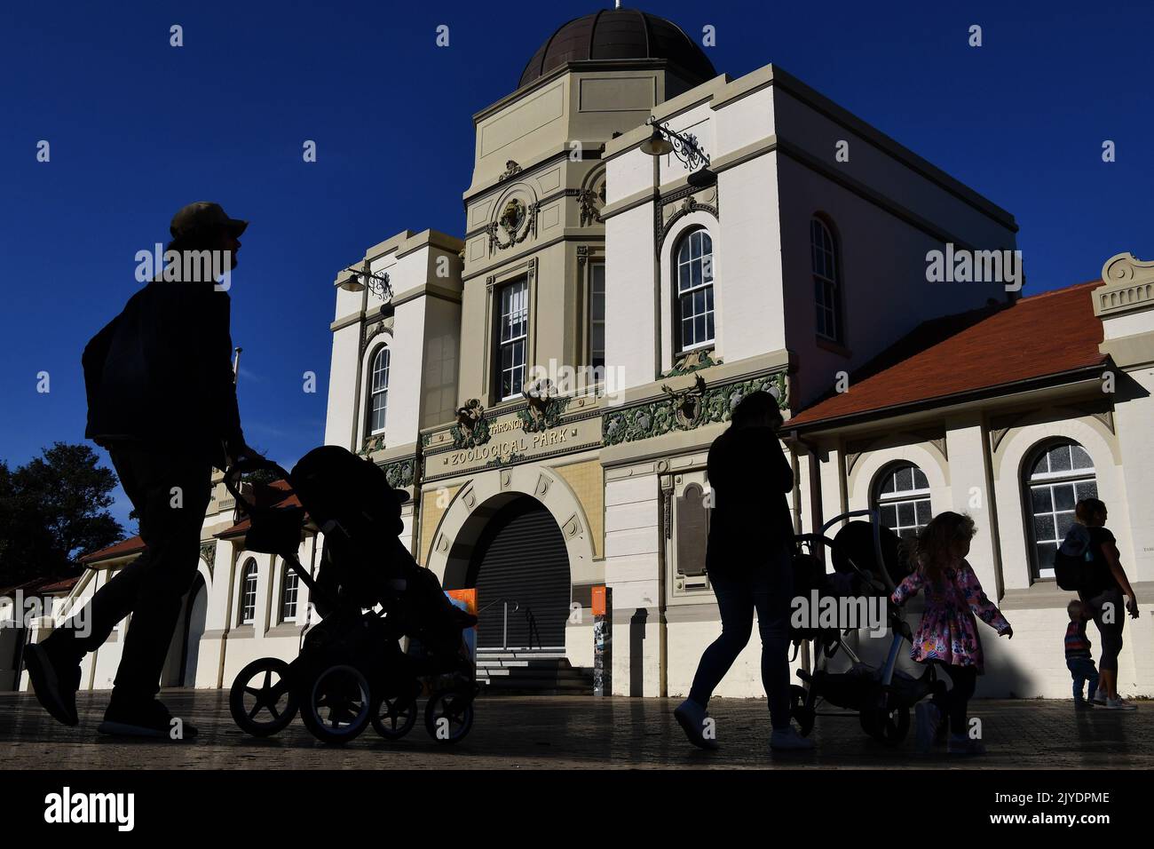 Crowds make their way through the main gate at Taronga Zoo in Sydney ...