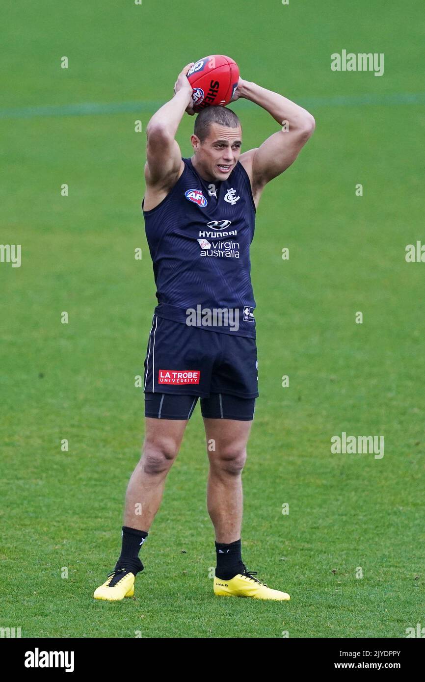 Ed Curnow of the Blues looks upfield during and AFL Carlton Blue ...