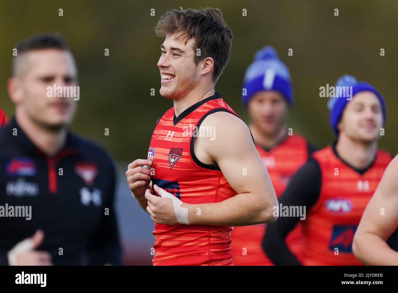 Zach Merrett of the Bombers reacts during an Essendon Bombers AFL ...