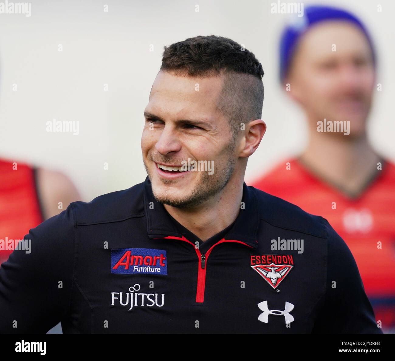 David Zaharakis of the Bombers is seen with a new hair cut during an ...