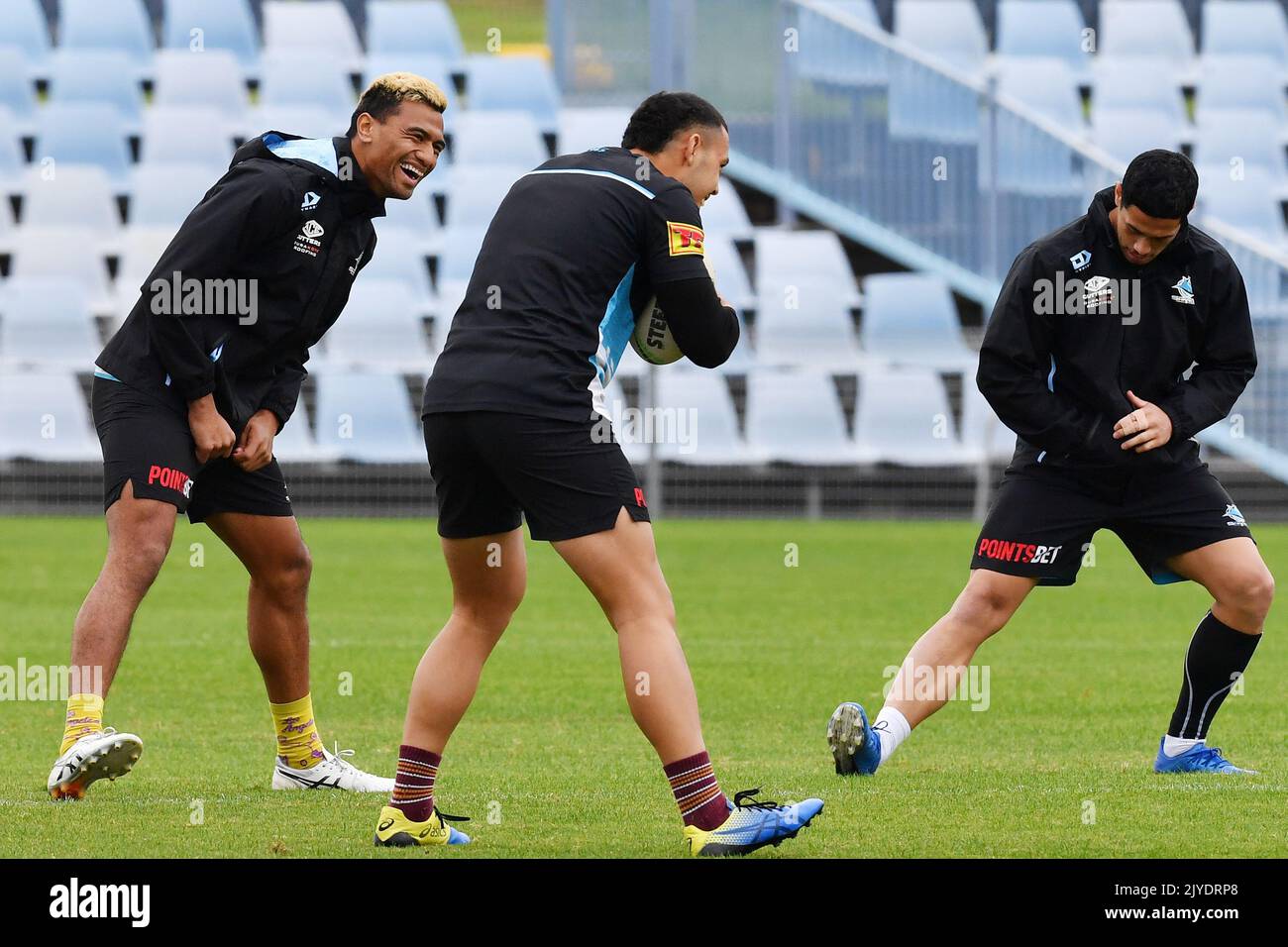 Sharks player Ronaldo Mulitalo (left) during an NRL Cronulla-Sutherland ...