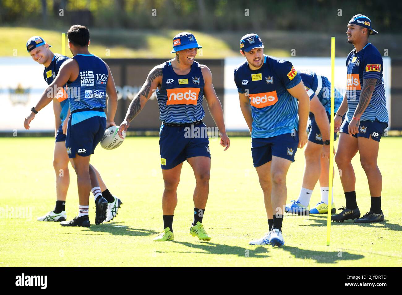 Erin Clark (centre) laughs during a Gold Coast Titans NRL training ...