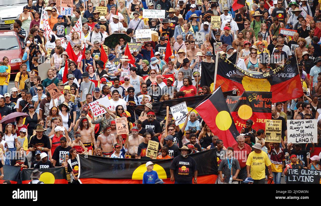 Aboriginal protestors march on the Queensland Police Headquarters in ...