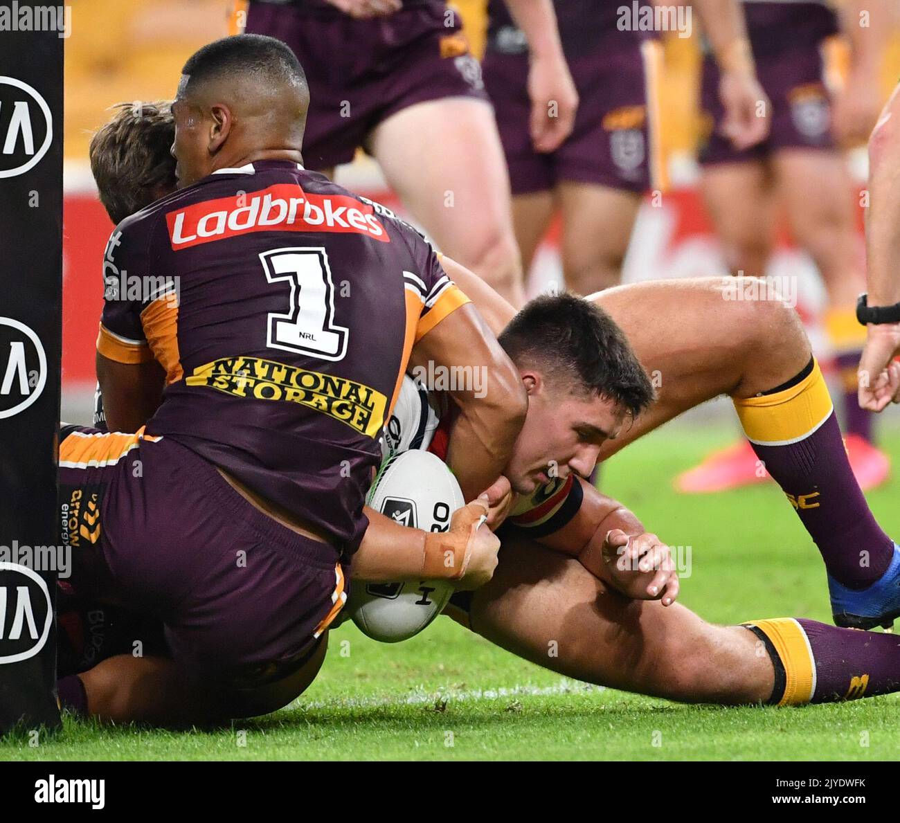 Victor Radley (centre) of the Roosters scores a try during the Round 4 ...