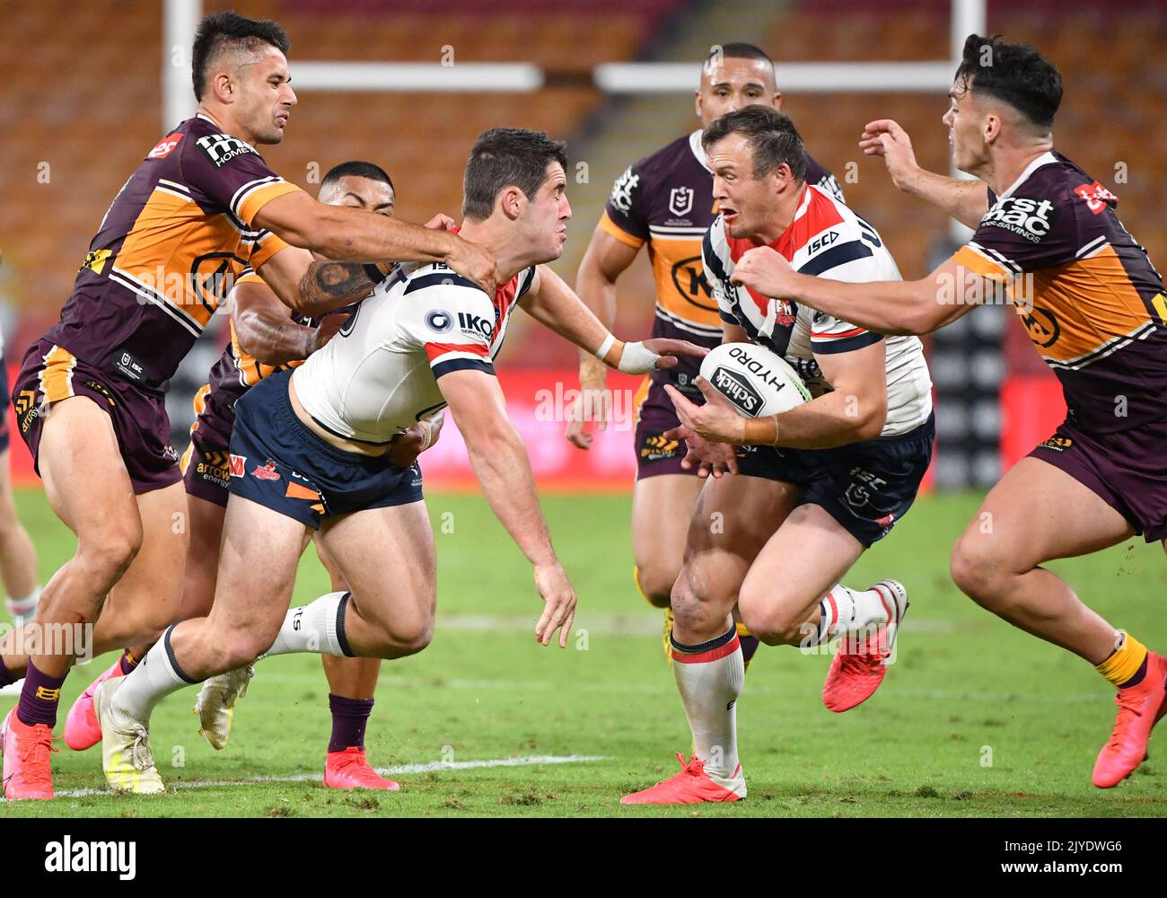 Nat Butcher gets his pass away to team mate Josh Morris of the Roosters ...