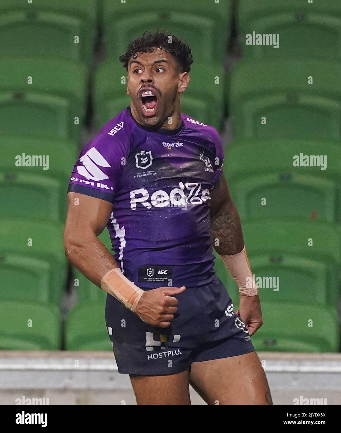 Josh Addo-Carr of the Storm celebrates after scoring a try during the ...