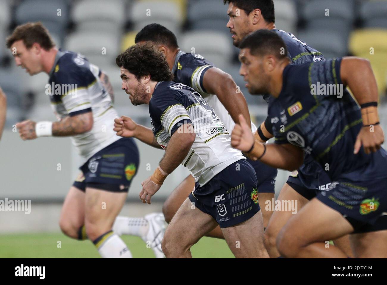 Jake Granville (centre) is seen during a warm up prior to the Round 4 ...