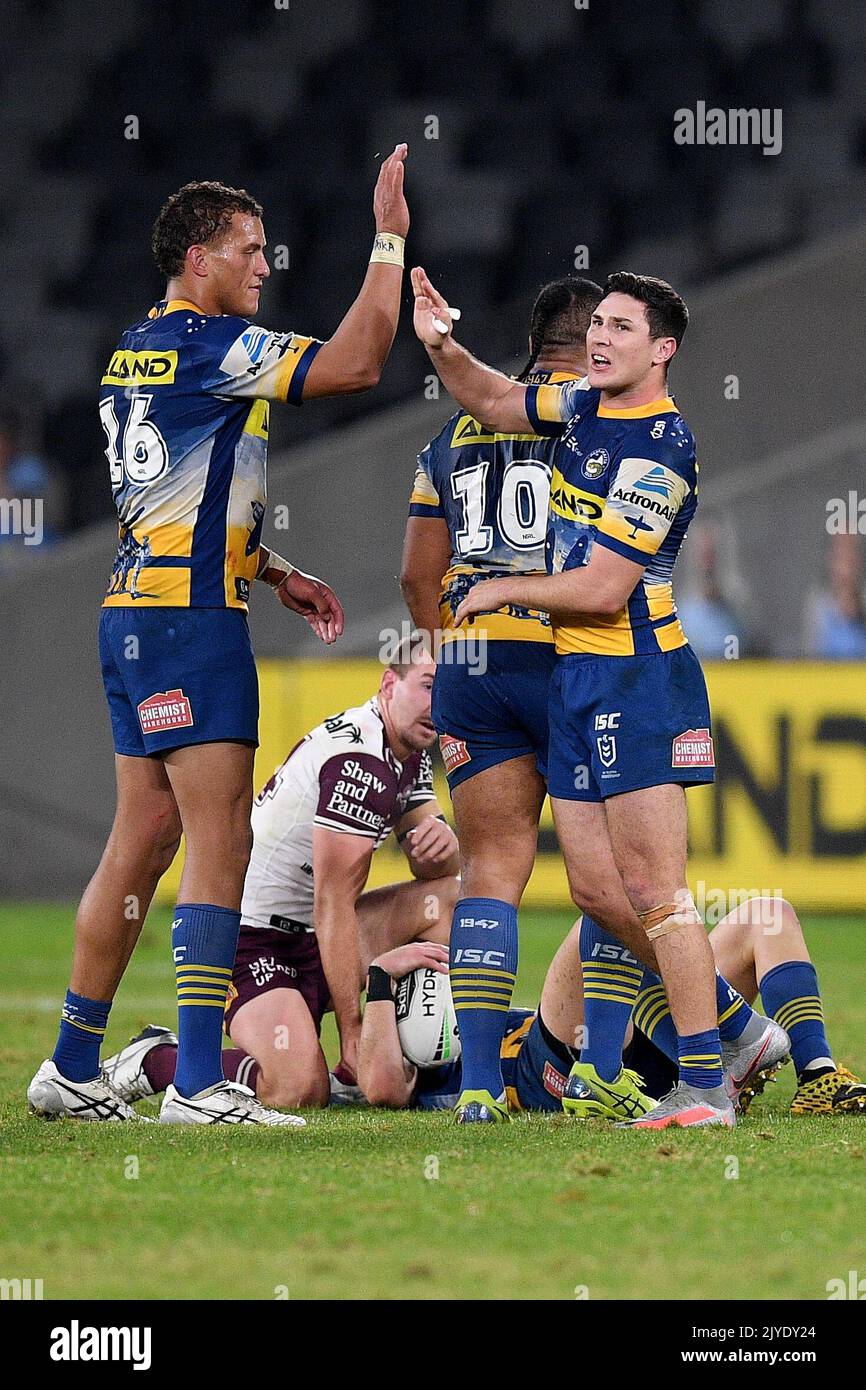 Mitch Moses (right) celebrates with Kane Evans of the Eels following ...