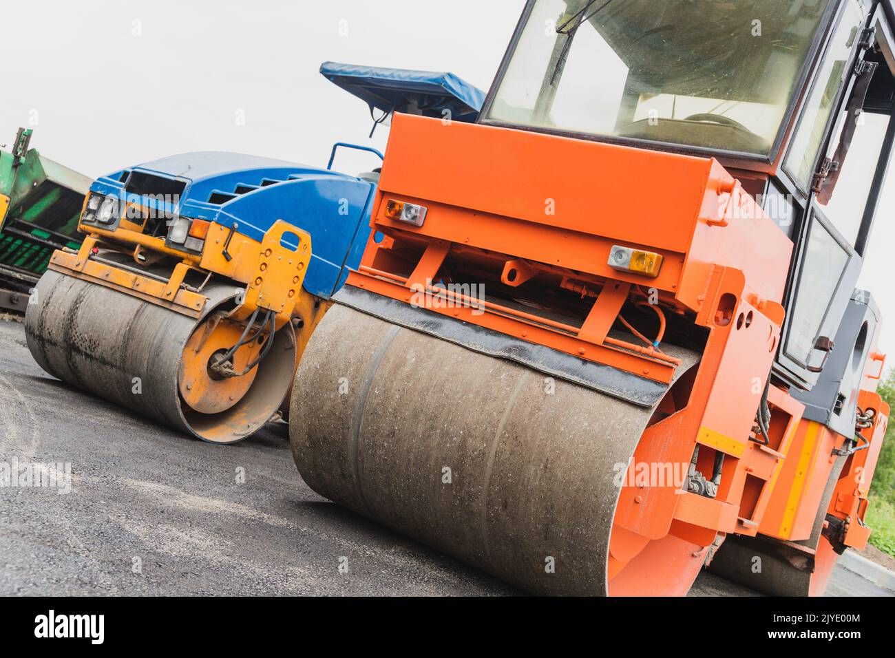Old paver close-up. Road roller. Road construction concept Stock Photo ...