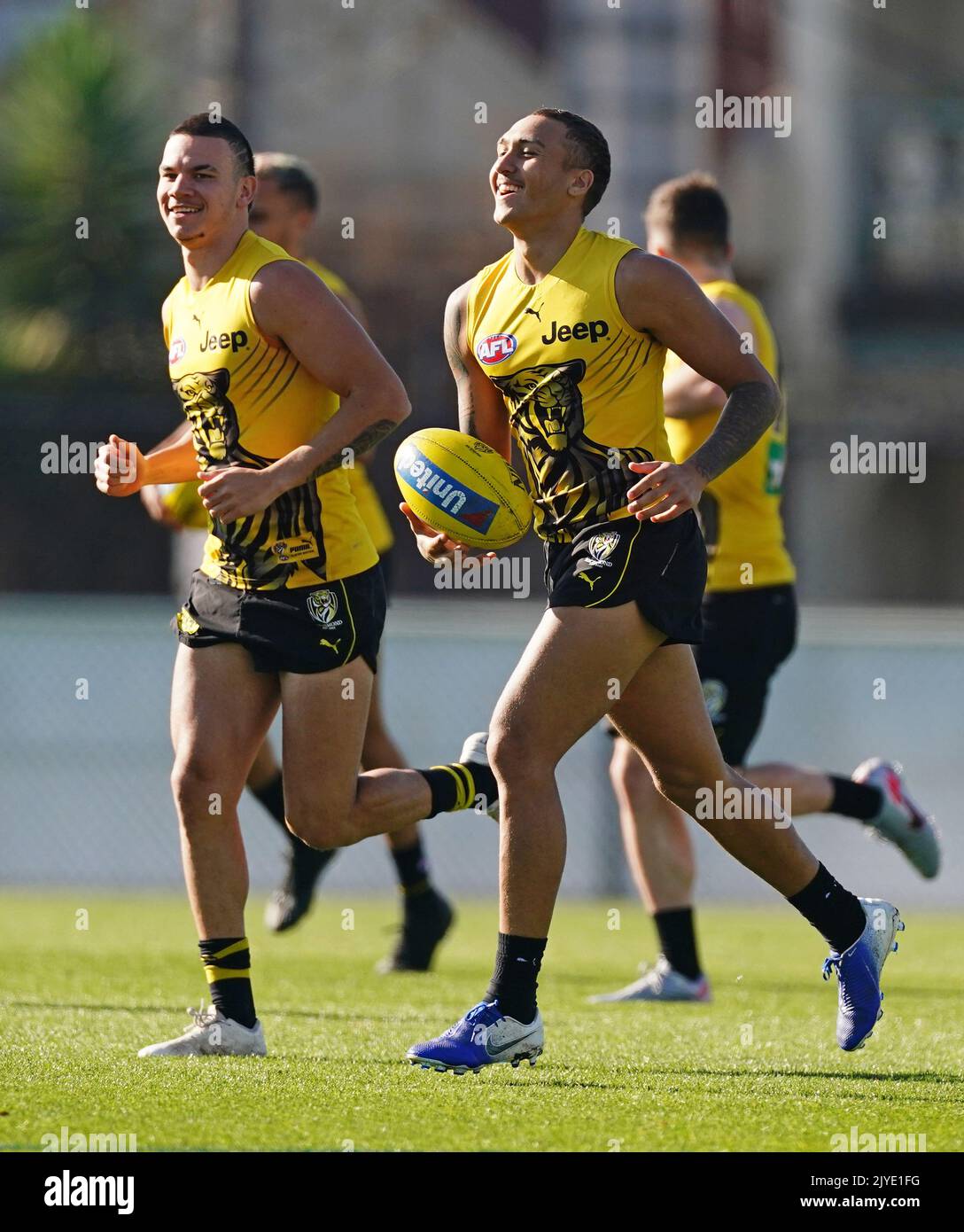 Daniel Rioli and Shai Bolton run during an AFL Richmond Tigers training ...