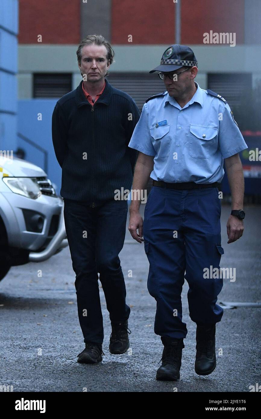Jonathan Peter Doig (left) leaves Sutherland Police Station in Sydney ...