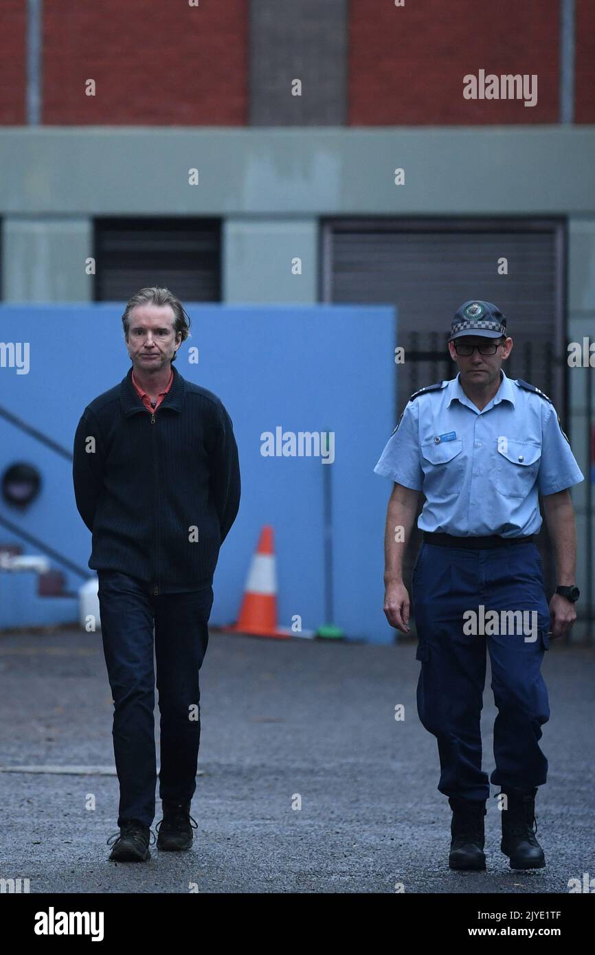 Jonathan Peter Doig (left) leaves Sutherland Police Station in Sydney ...