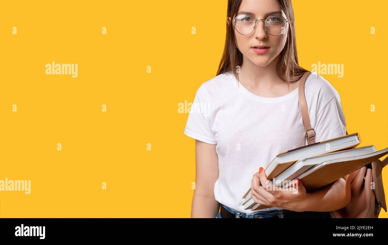 smart student high school woman glasses notebooks Stock Photo - Alamy