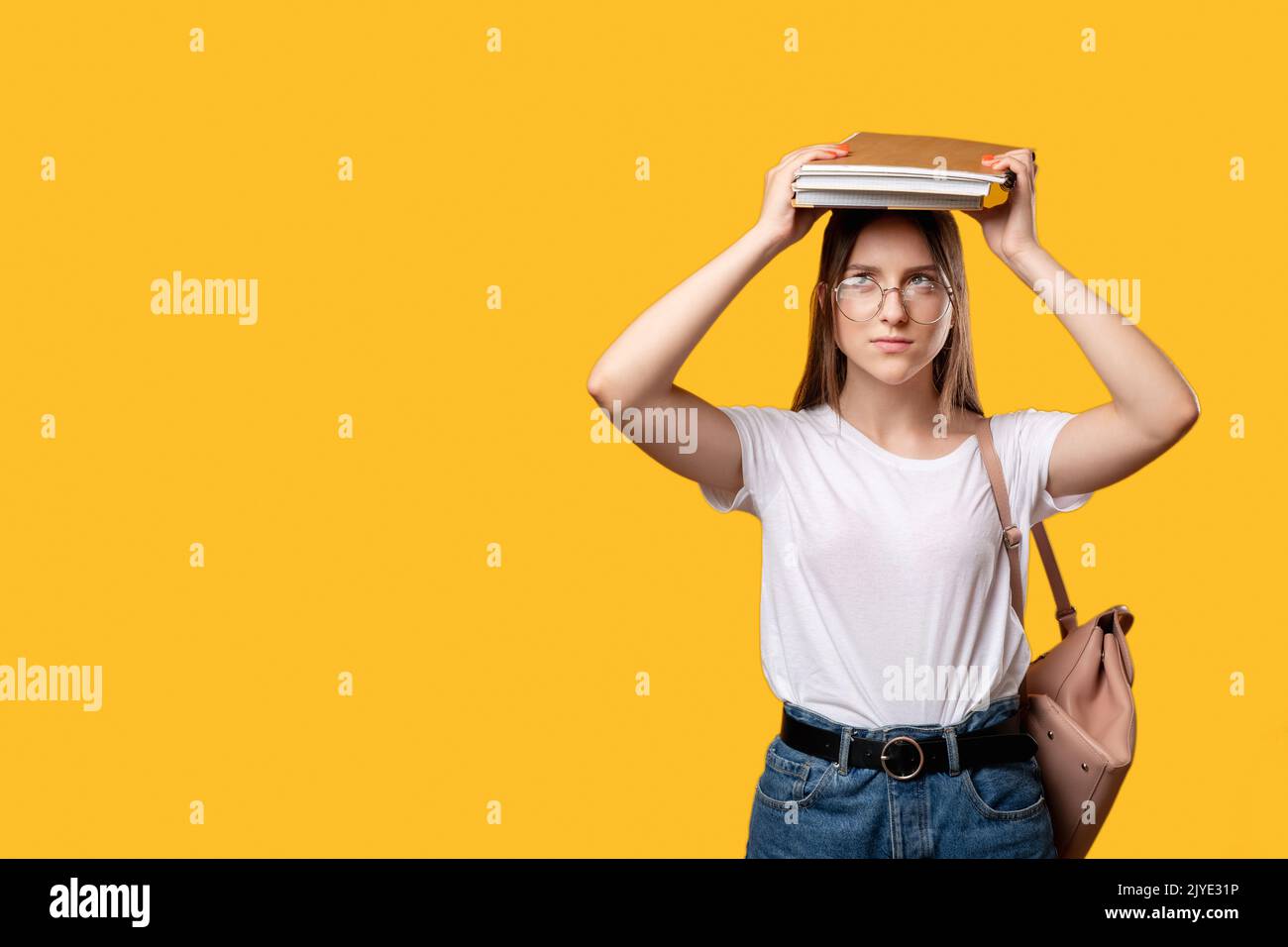 difficult task smart student young woman notebooks Stock Photo - Alamy
