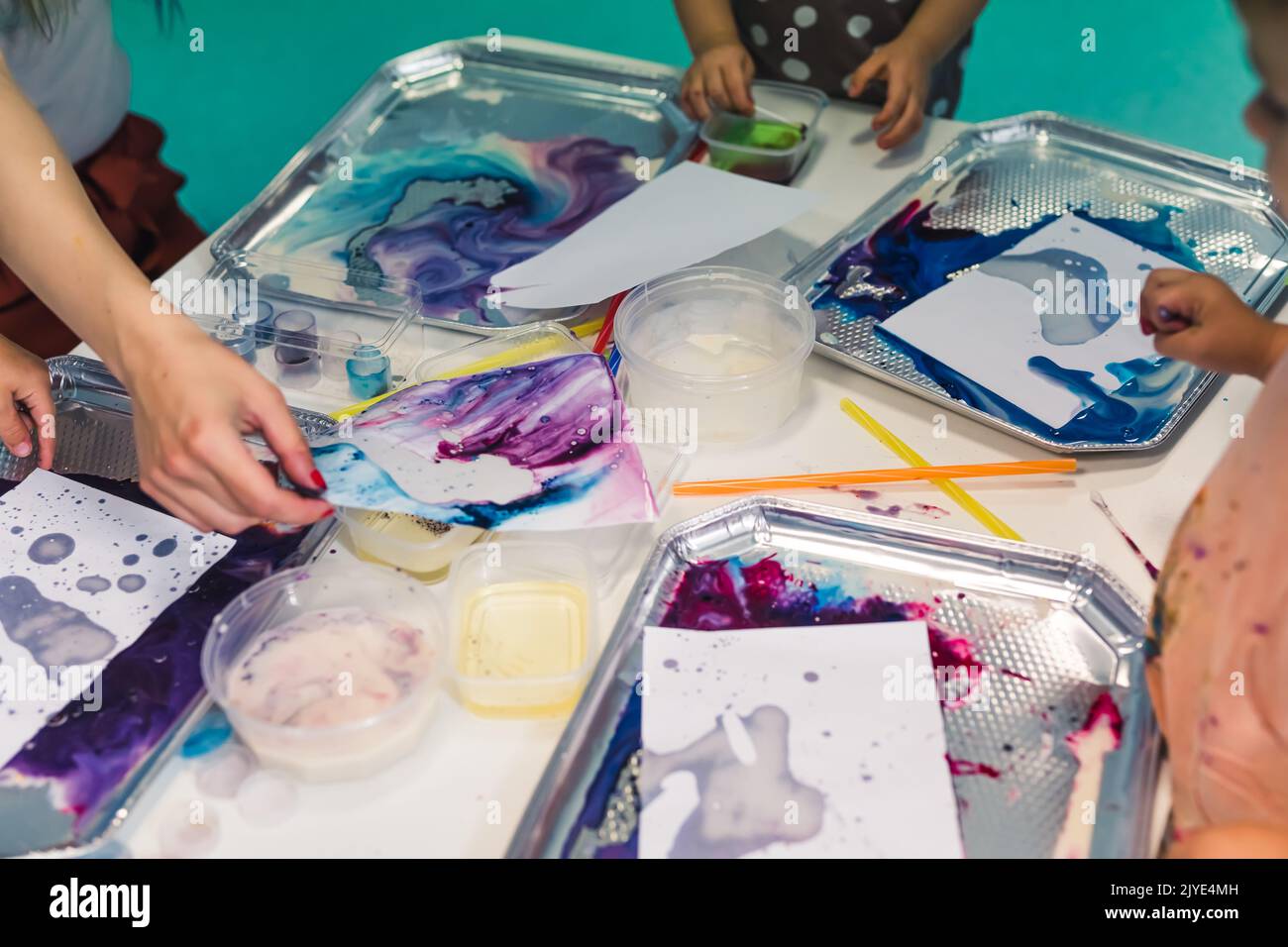 Sensory play for brain development at nursery school. Toddlers playing ...