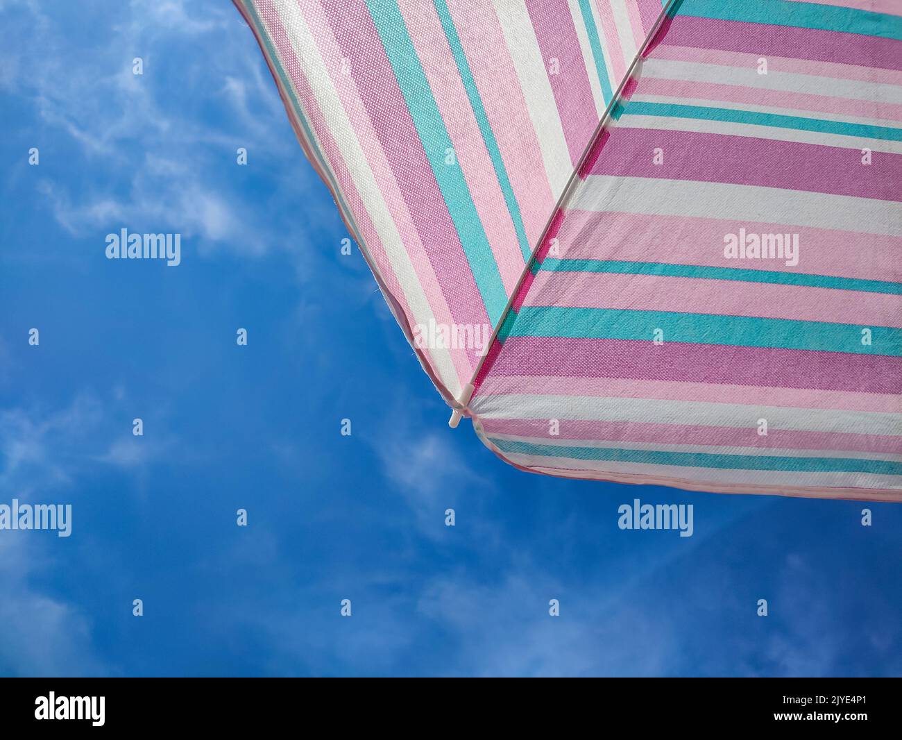 View of the sky under a parasol Stock Photo - Alamy