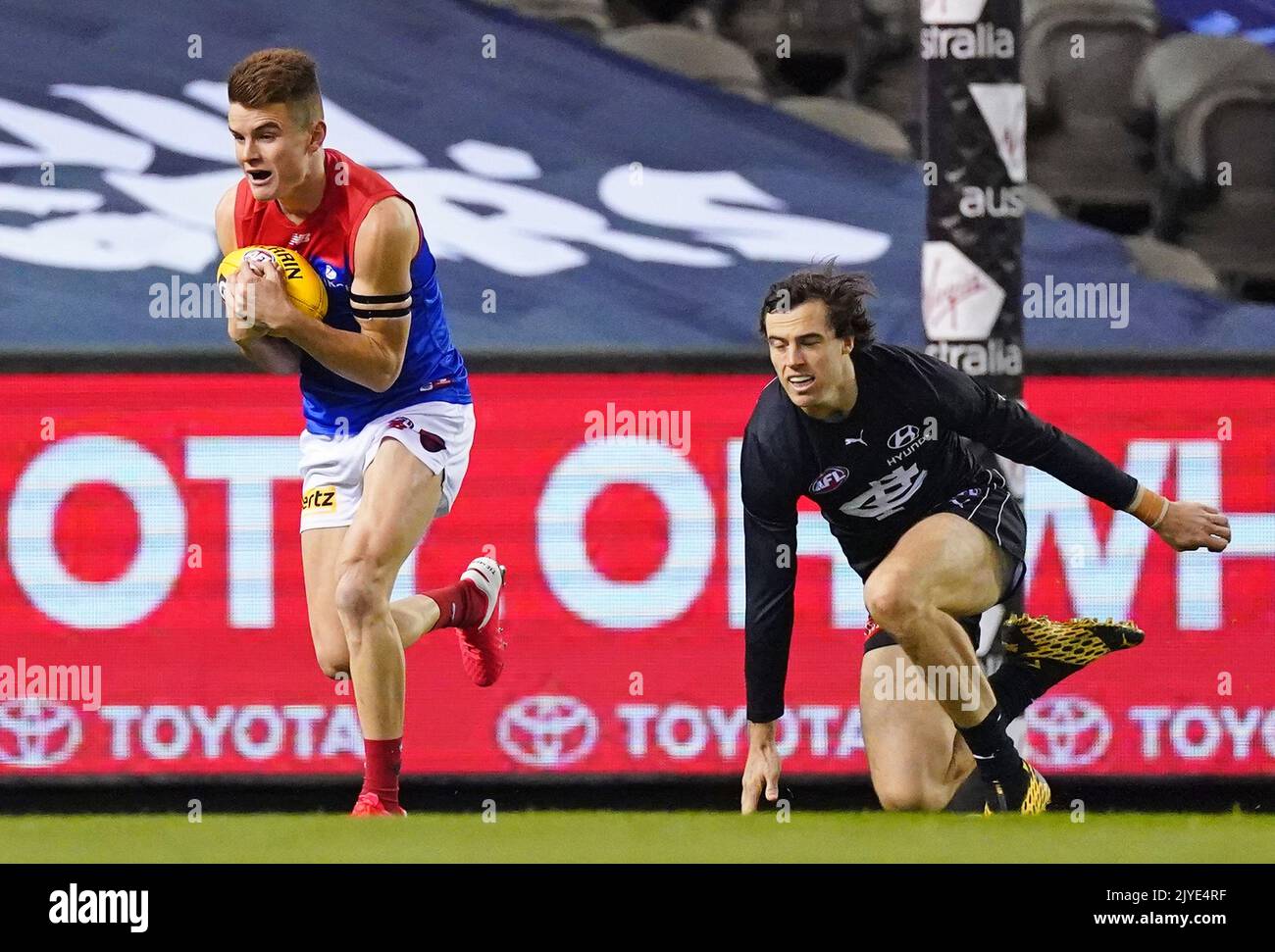 Bayley Fritsch of the Demons marks the ball during the Round 2 AFL ...