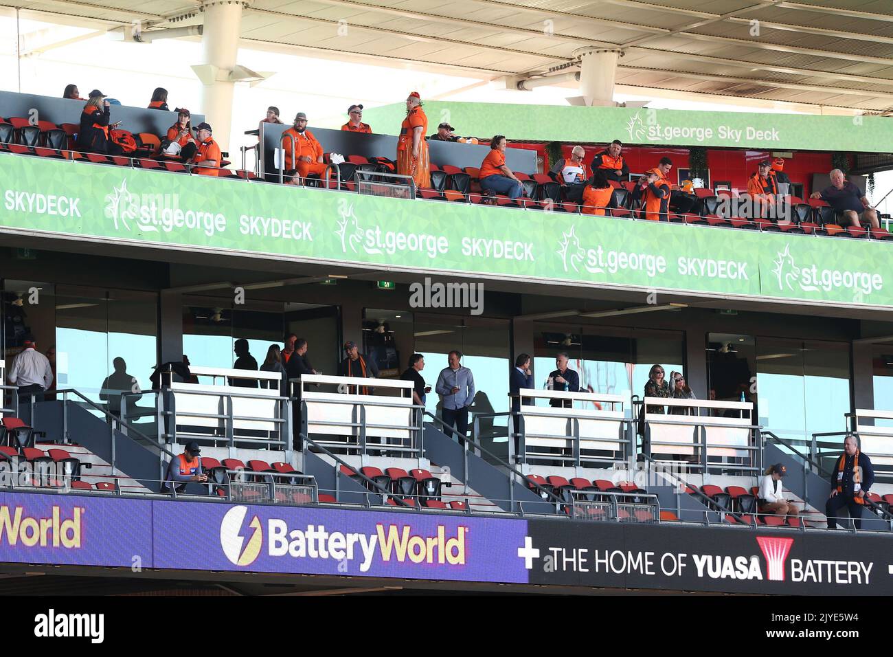 A small number of crowd look on during the Round 2 AFL match between ...