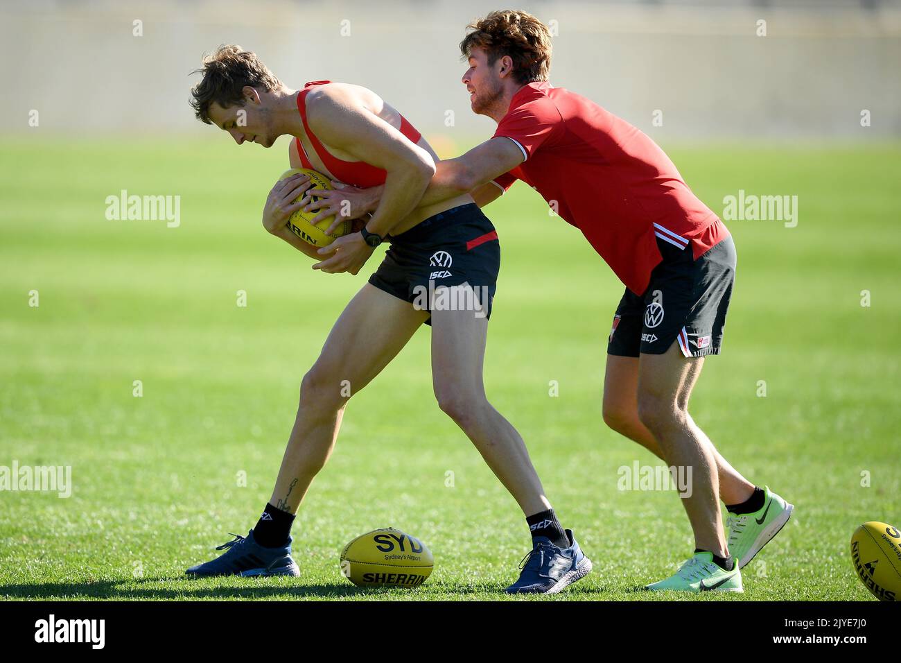 Jordan Dawson and Dane Rampe take part in an AFL Sydney Swans training ...