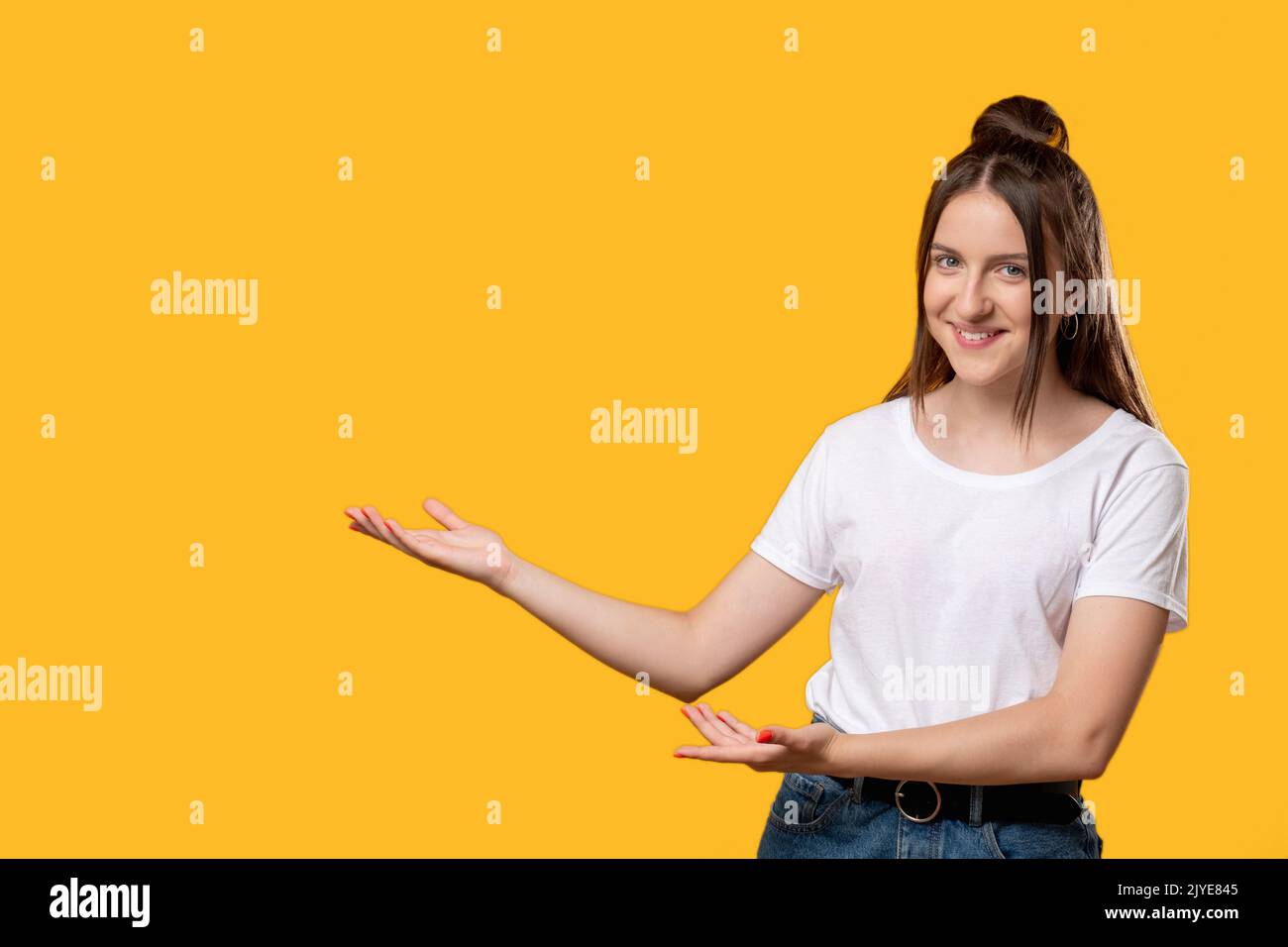 Inviting gesture beautiful young woman hi-res stock photography and ...