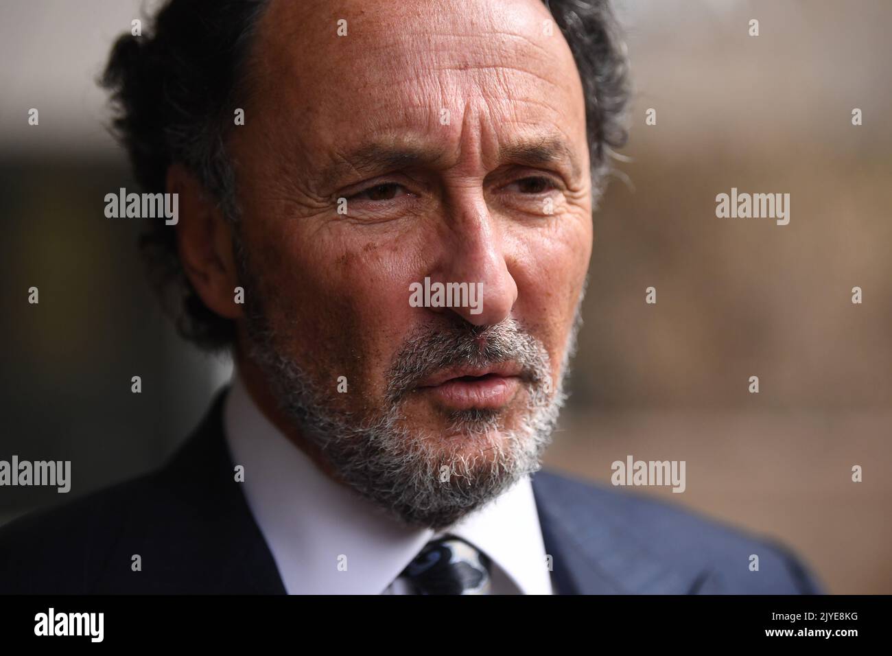 Rodney Adler speaks to the media as he leaves the Downing Centre ...