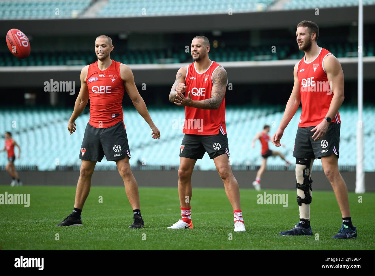 (L-R) Sam Reid, Lance Franklin and Michael Knoll during a Sydney Swans AFL training session at ...