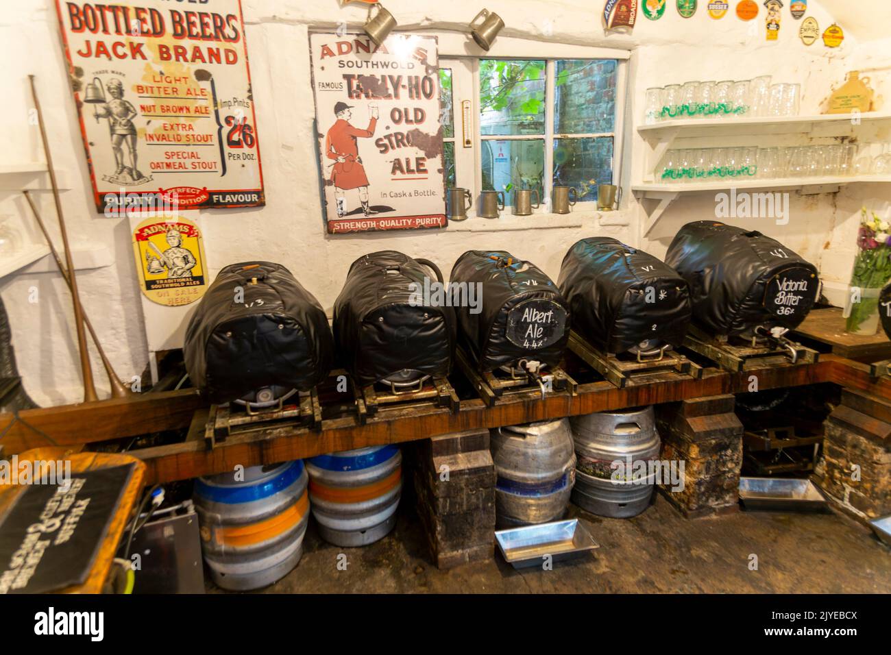 Barrels of real ale in tap room of Kings Head pub, the Low House ...