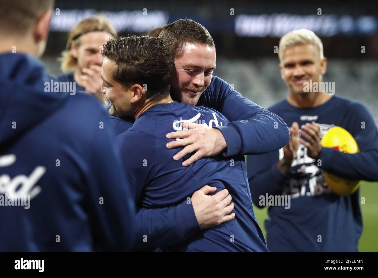 Jack Steven of the Cats embraces Luke Dahlhaus of the Cats after ...