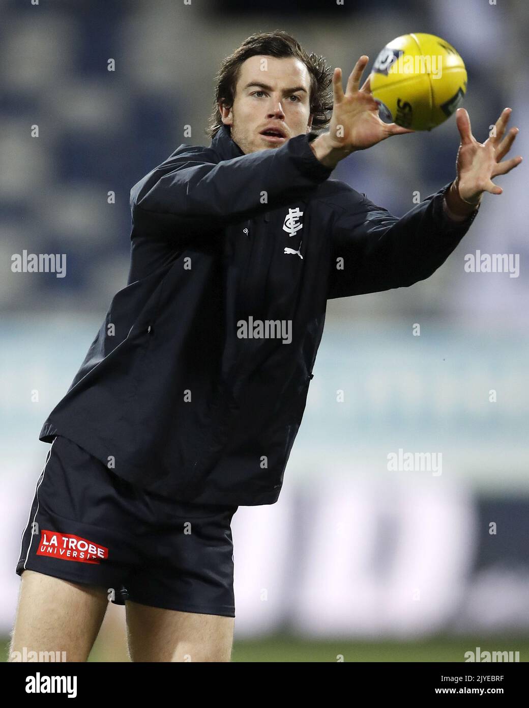 Lachie Plowman of the Blues is seen warming up before the Round 3 AFL ...