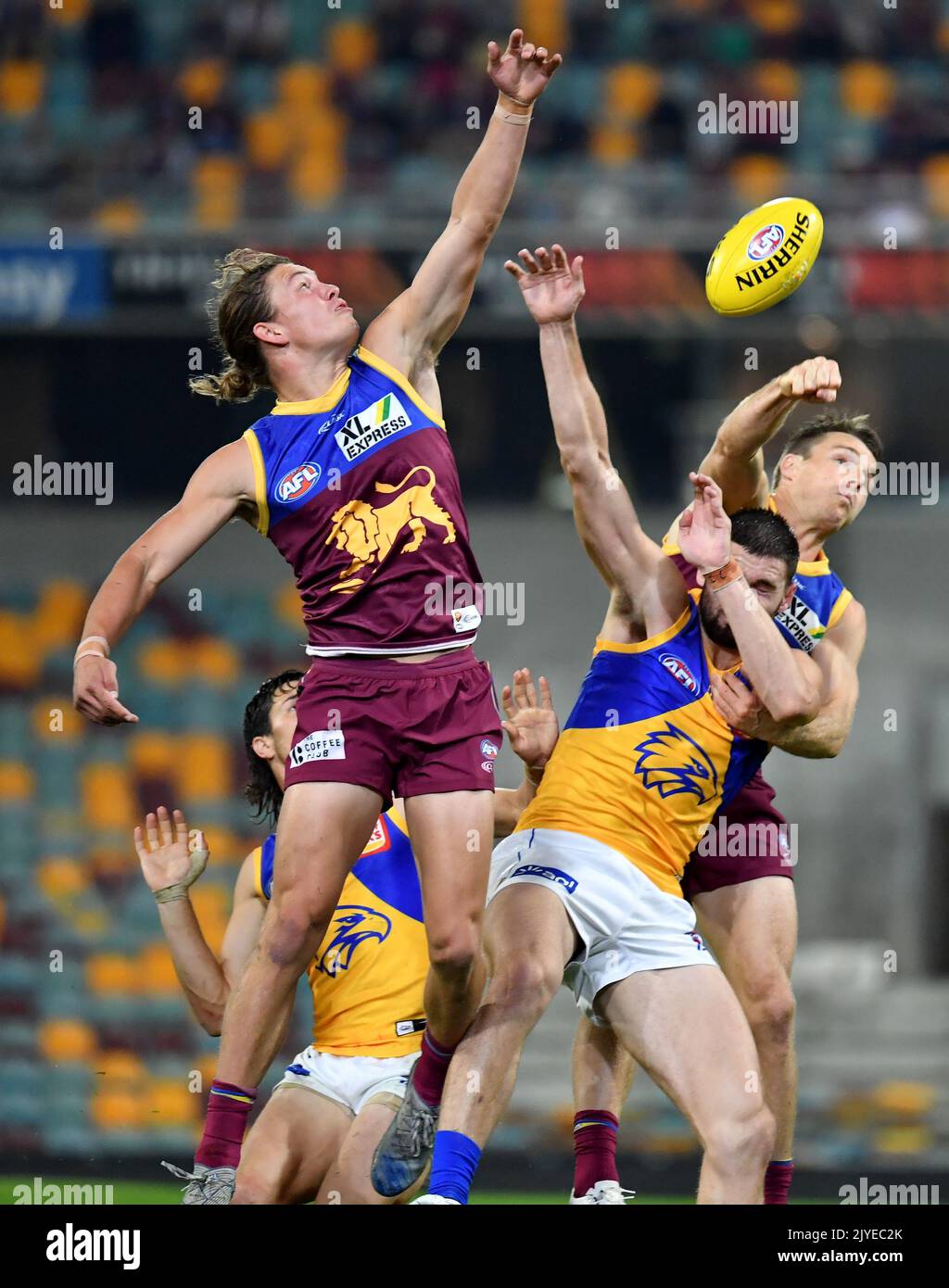 Jarrod Berry (left) of the Lions in action during the Round 3 AFL match ...