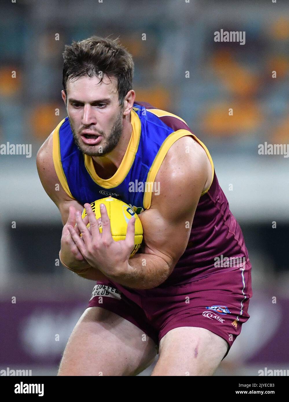 Grant Birchall of the Lions takes a mark during the Round 3 AFL match ...