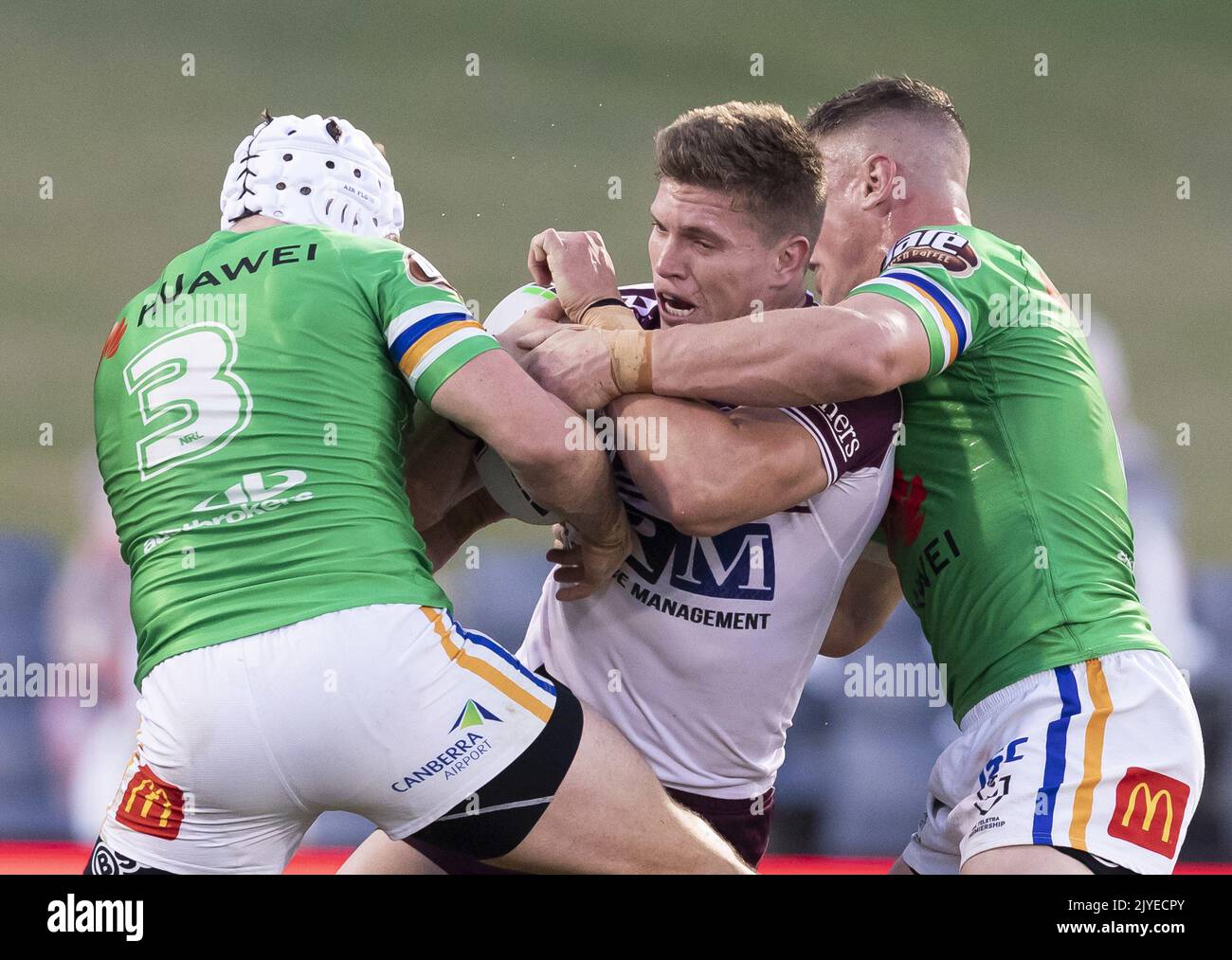 Reuben Garrick of the Sea Eagles is tackled by Jack Wighton of the ...