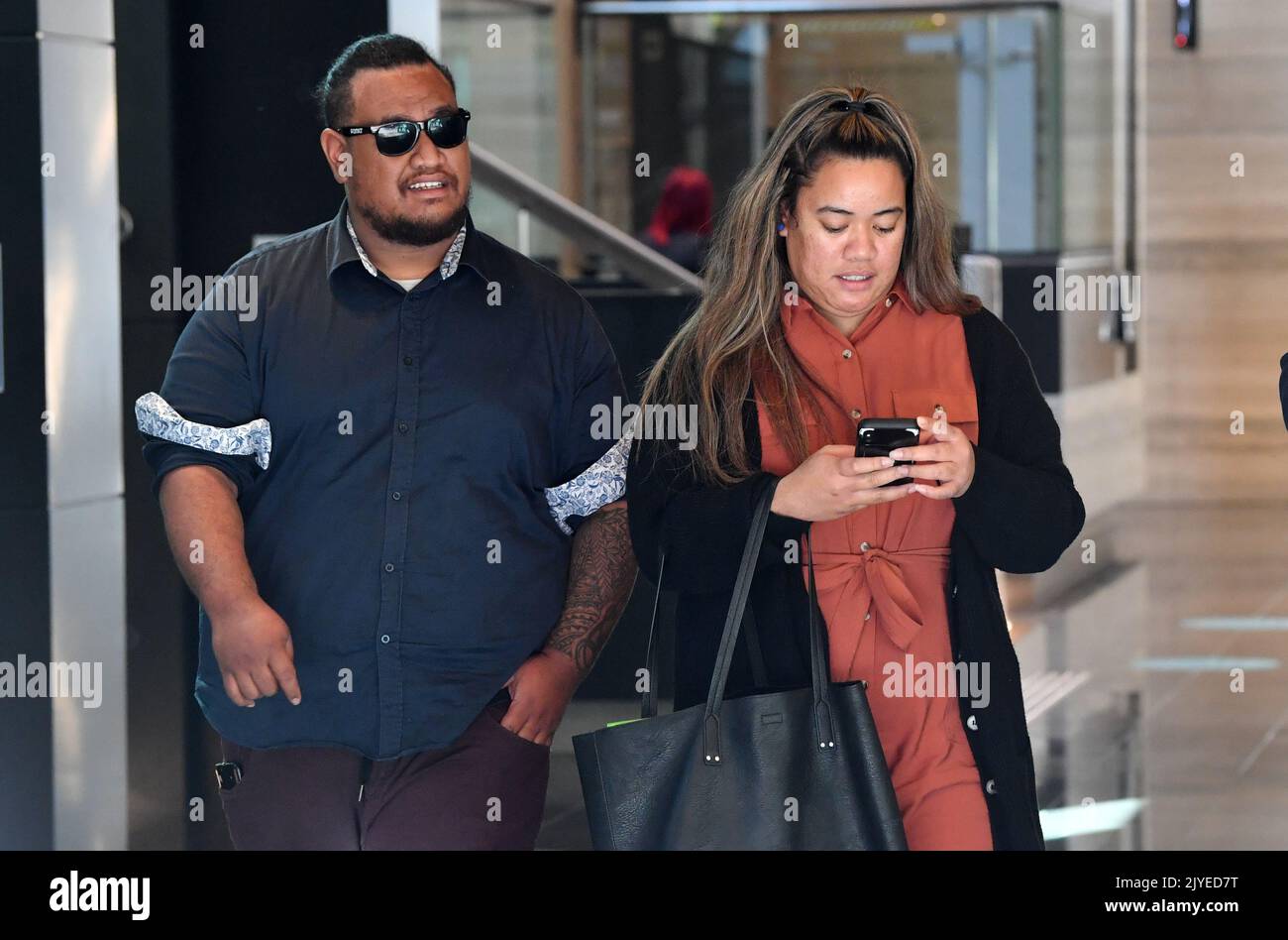 Jason and Wendy Taniela are seen leaving a QCAT (Queensland Civil and ...