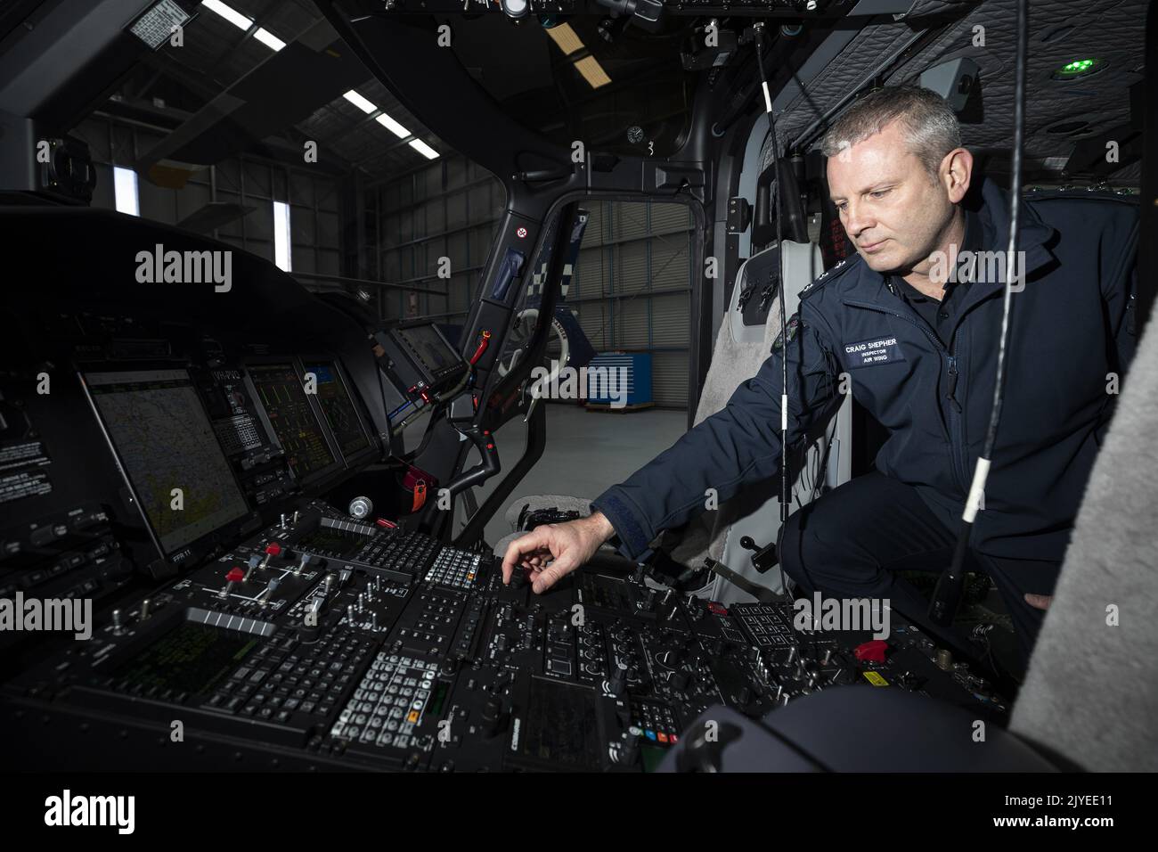 Victoria Police Air Wing Inspector Craig Shepherd poses for a ...