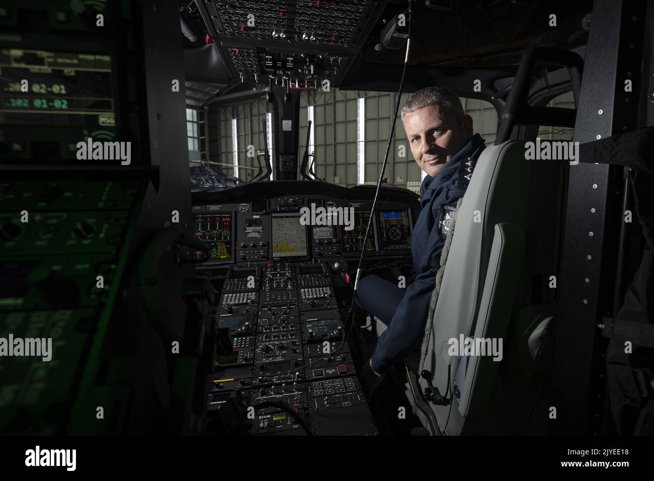 Victoria Police Air Wing Inspector Craig Shepherd poses for a ...