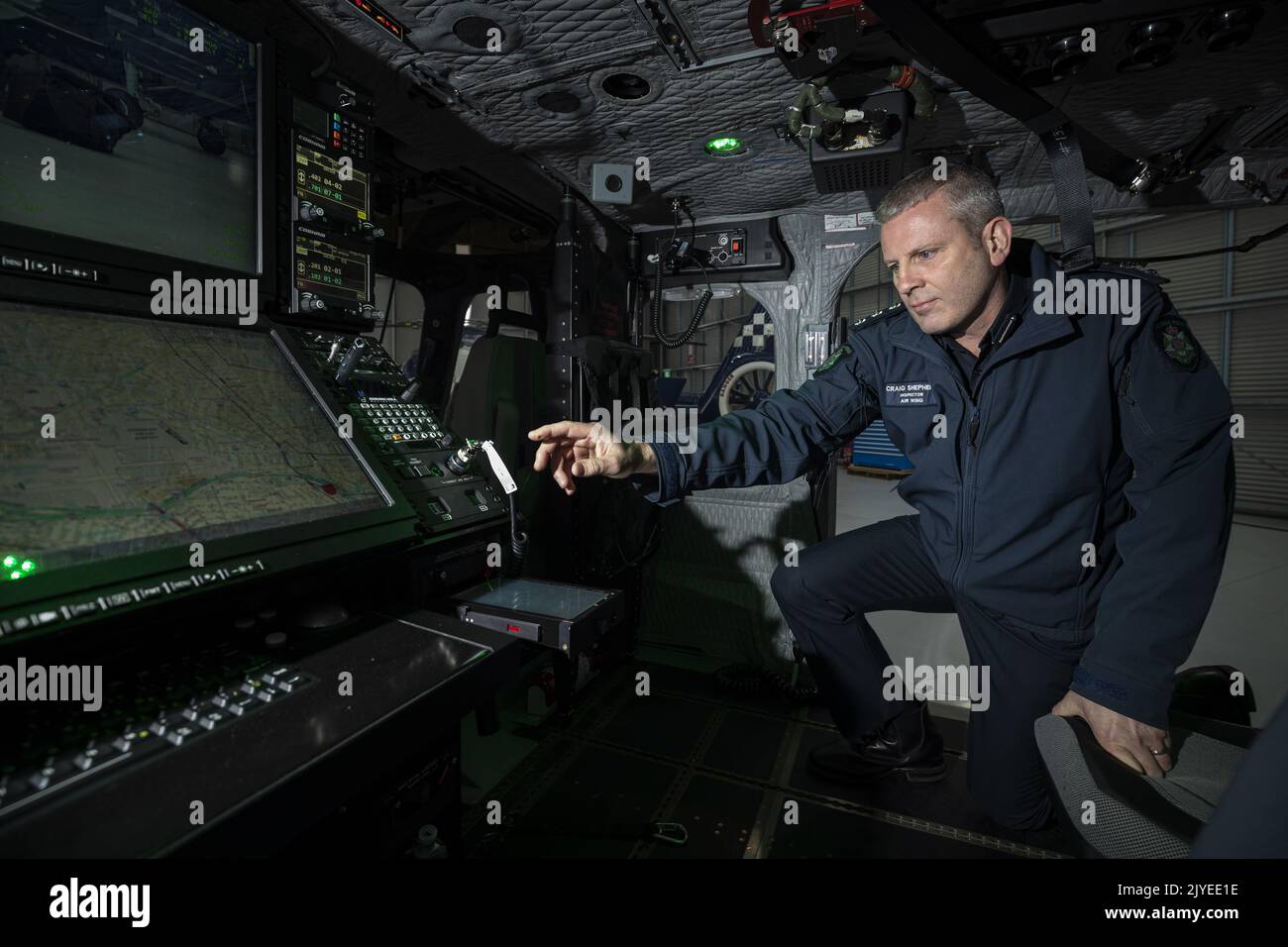 Victoria Police Air Wing Inspector Craig Shepherd poses for a ...