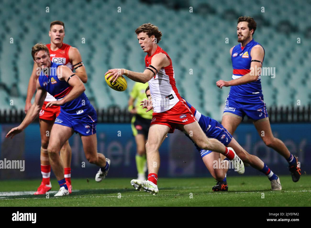 Callum Mills of the Swans kicks for goal during the Round 4 AFL match ...