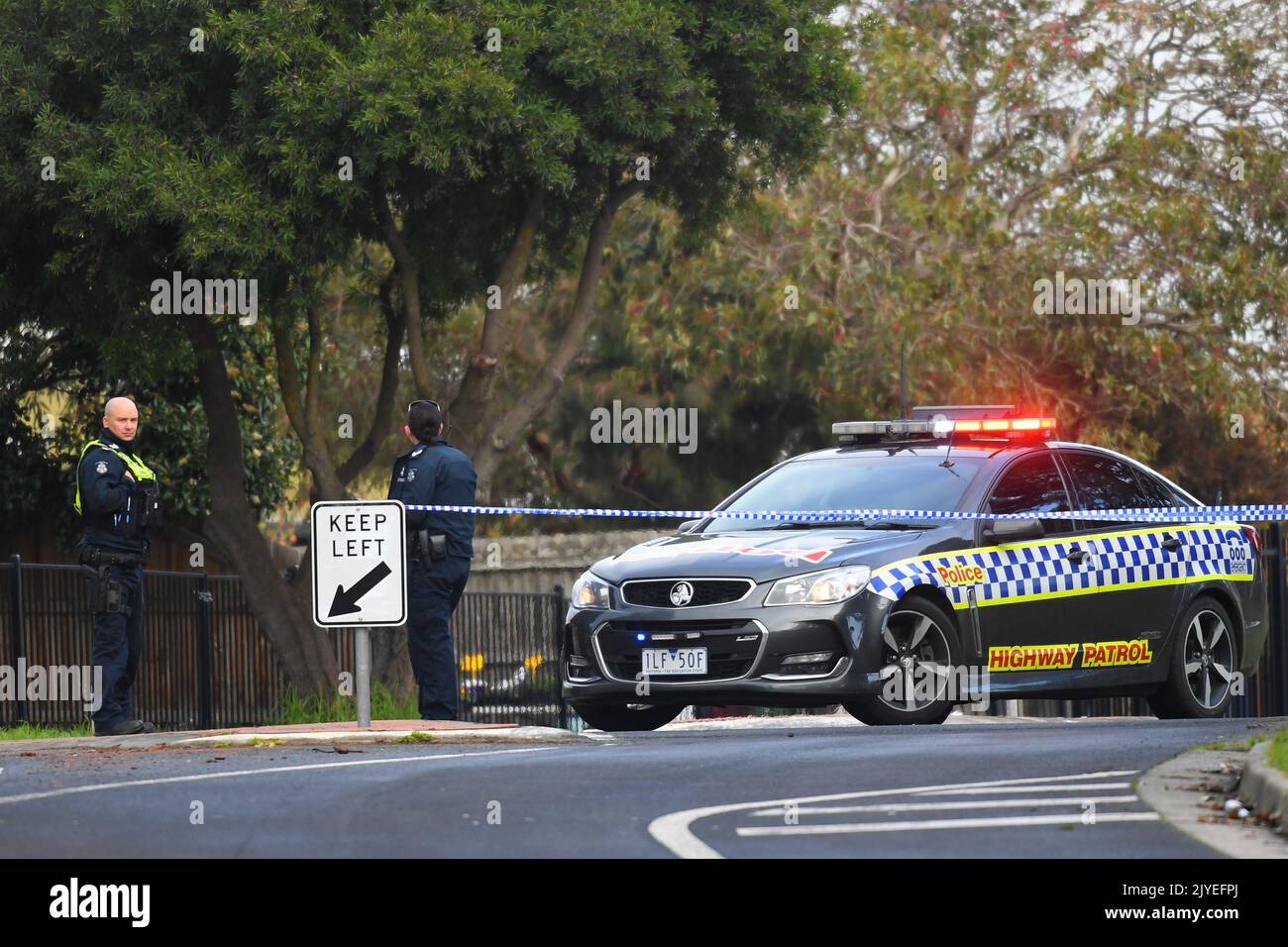 Victorian Police officers are seen at a crime scene outside of Donnelly ...