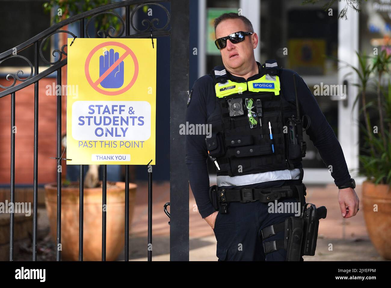 A Victorian Police officer exits the Range Bank Primary School in ...