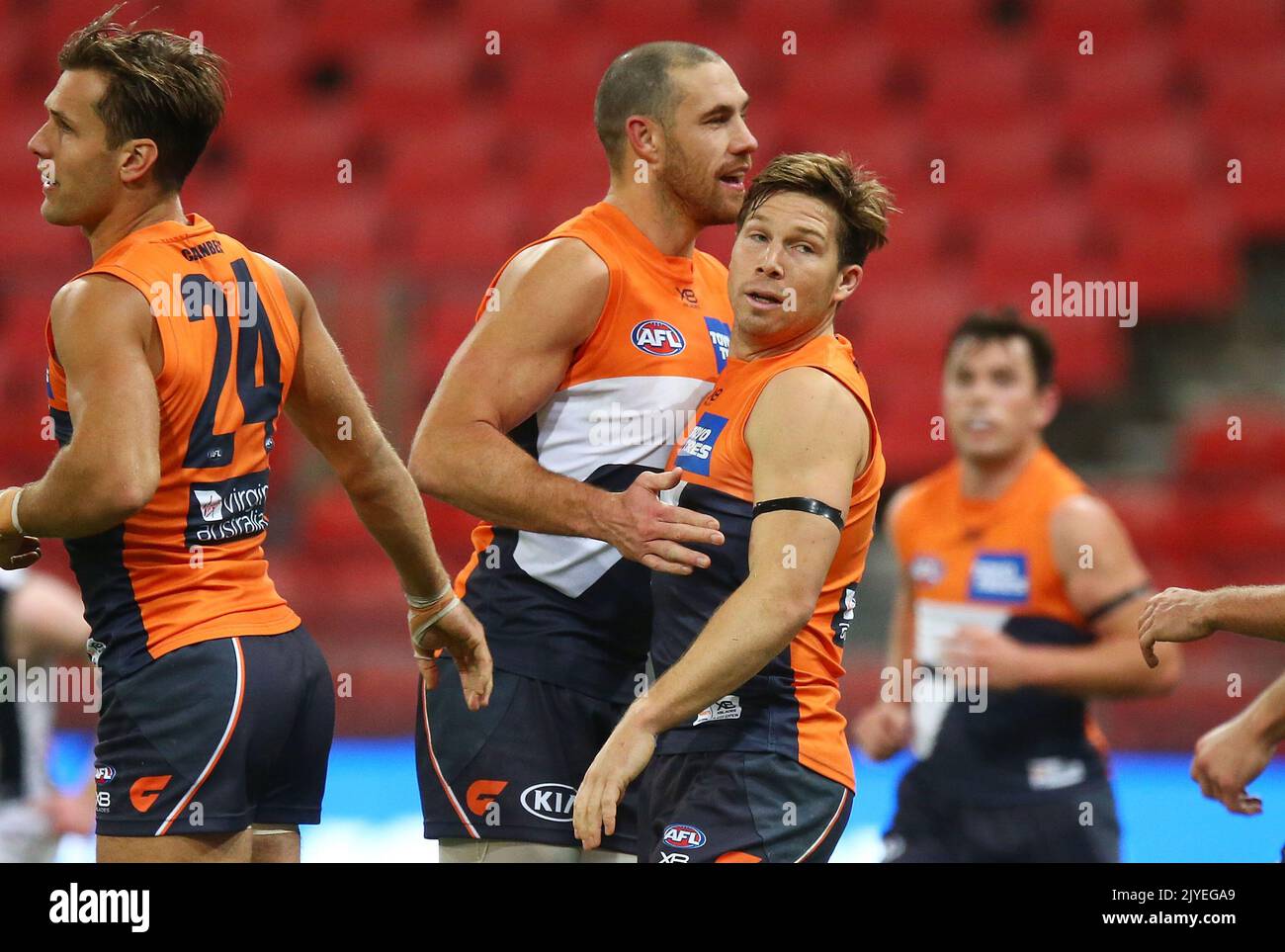Toby Greene of the Giants celebrates a goal with team mates during the ...