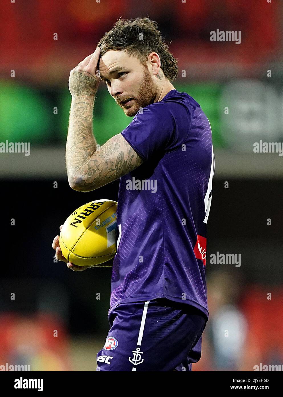 Nathan Wilson of the Dockers is seen during a warm-up prior to the ...