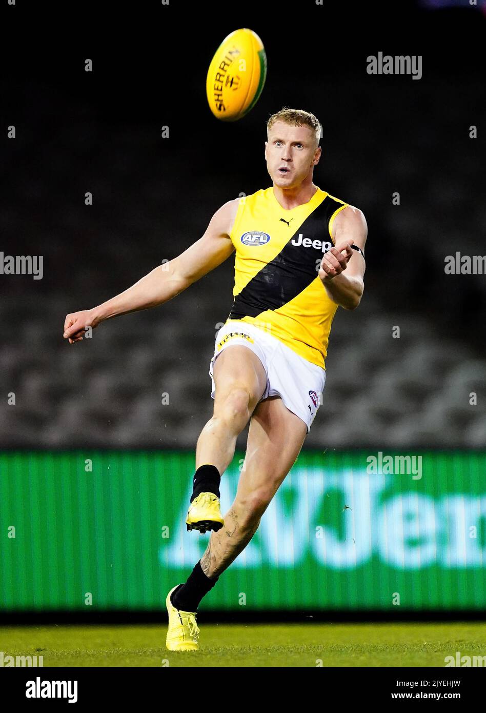 Josh Caddy of the Tigers runs with the ball during the Round 4 AFL ...