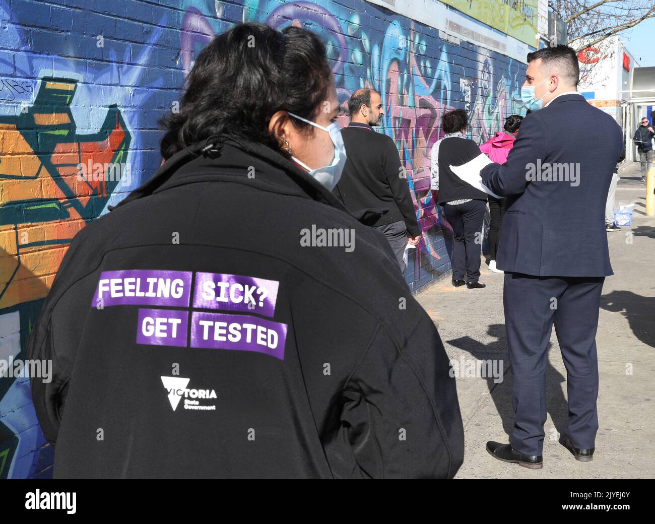 Iman Bekim Hasani (right) of the Albanian Mosque in Carlton helps out ...